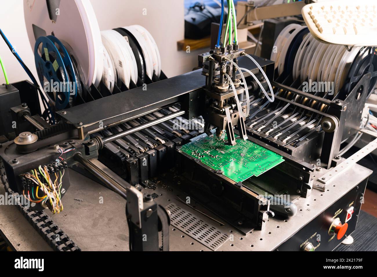 Electronic engineering concept. Surface-mount device in use. Printed ...