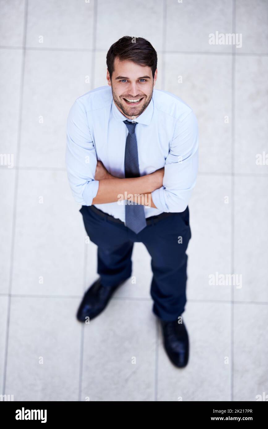 Aiming for the top. High angle portrait of a handsome and confident ...