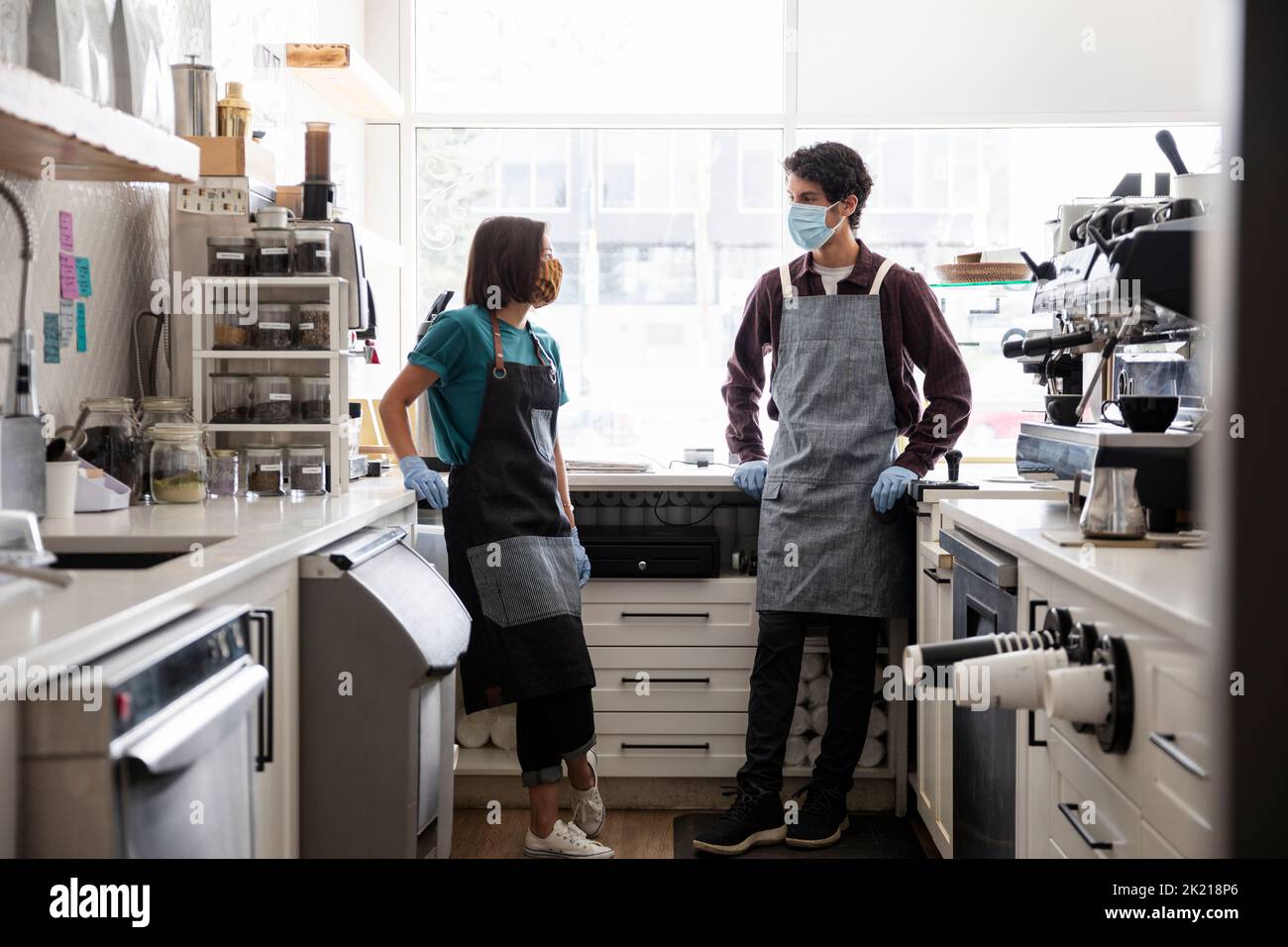 Man in apron rubber gloves hi-res stock photography and images - Alamy