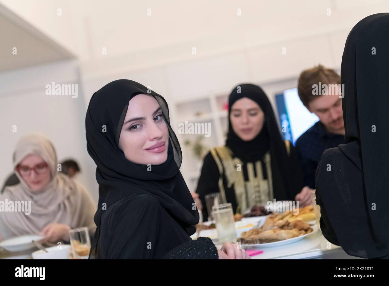 Muslim family making iftar dua to break fasting during Ramadan Stock ...
