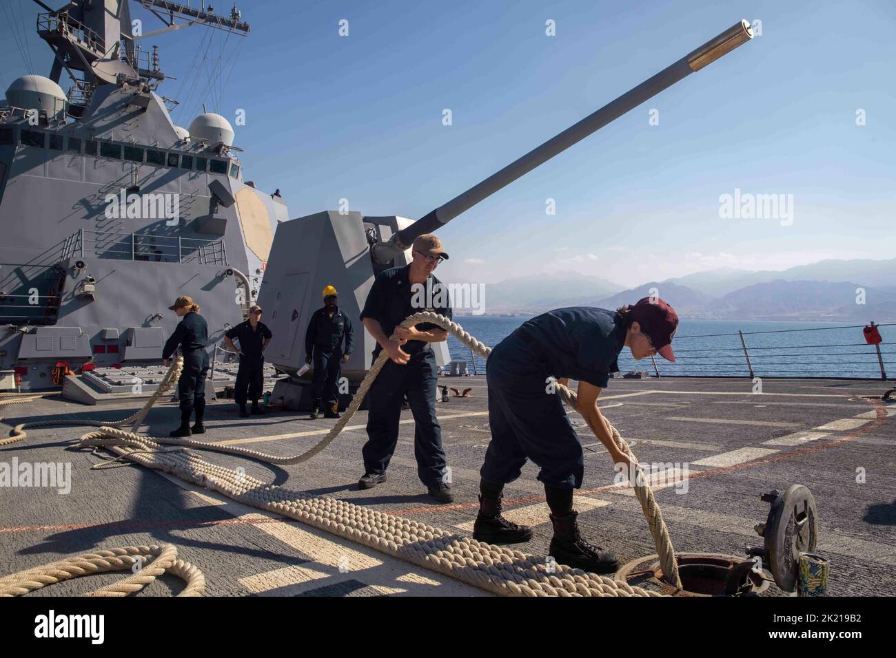 220920-N-EH998-1078 RED SEA (Sept. 20, 2022) Sailors line handle aboard ...