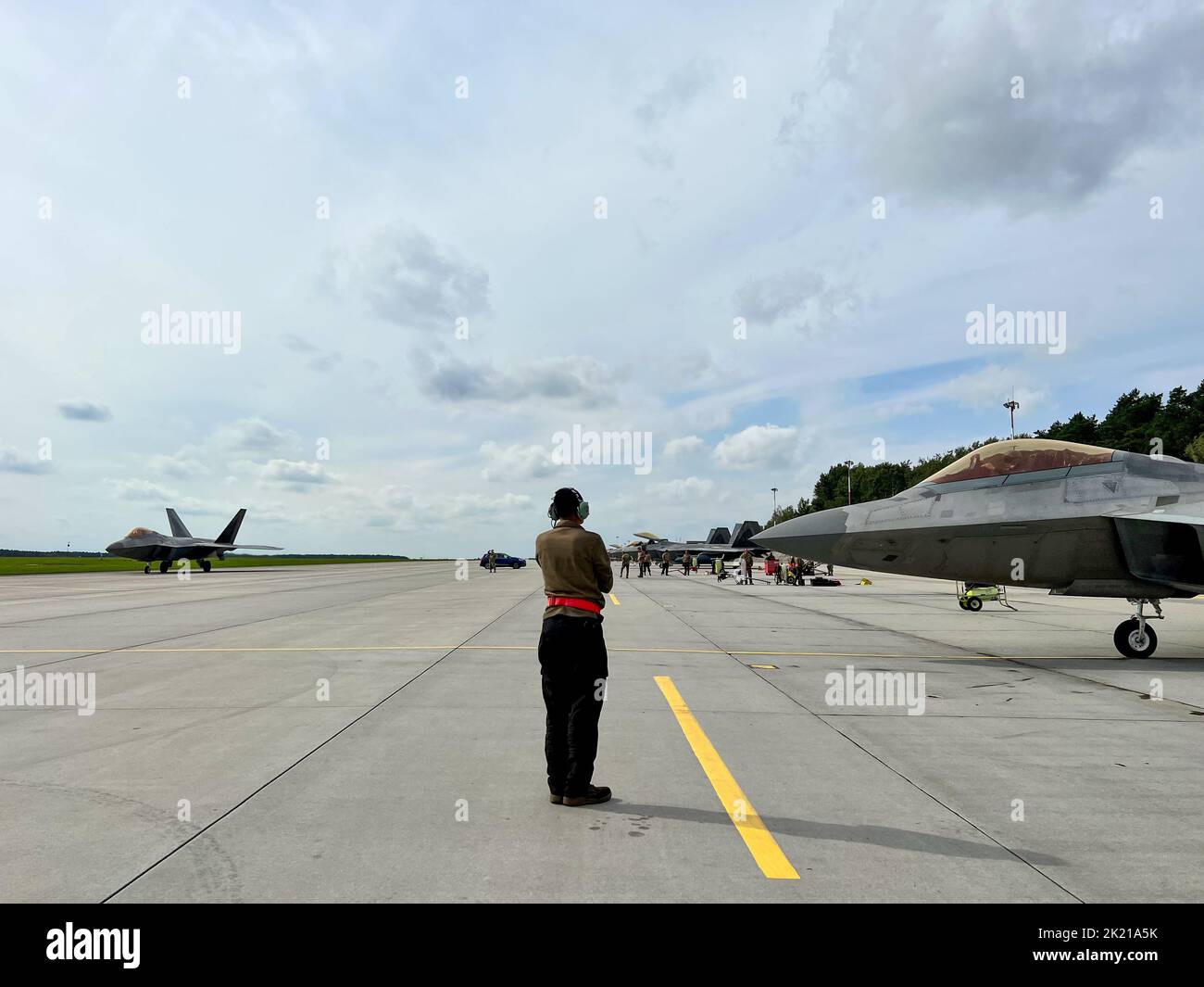 A U.S. Air Force crew chief assigned to the 90th Expeditionary Fighter ...