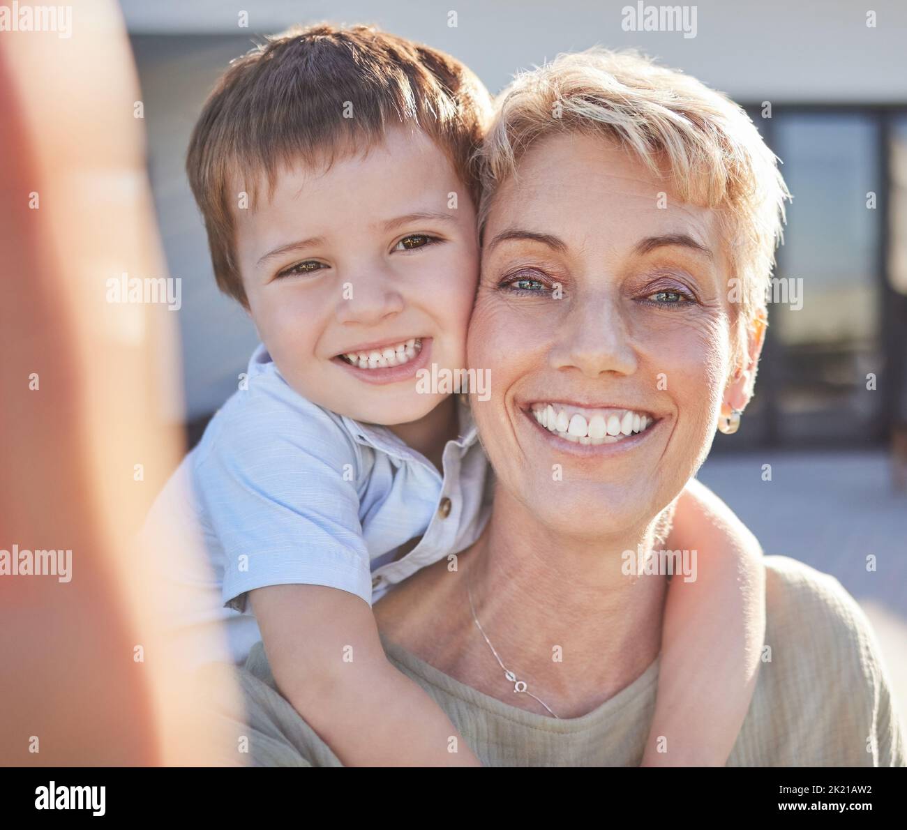 Selfie, grandma and child love to smile, play and bond together outdoor ...