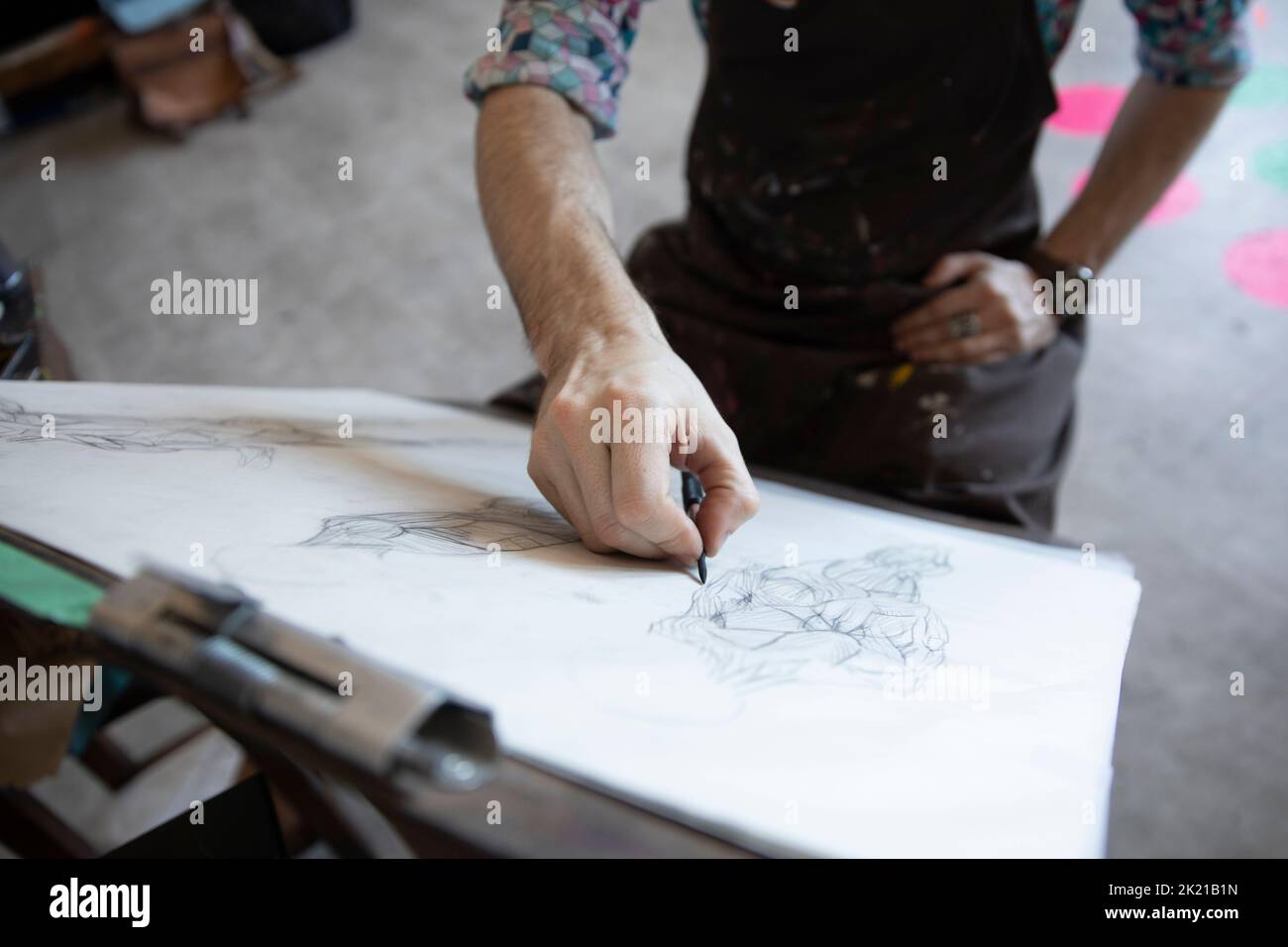 Male artist sketching in art studio hi-res stock photography and images ...