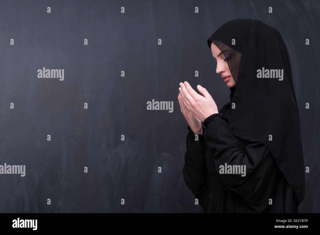 Muslim woman making traditional prayer hi-res stock photography and ...