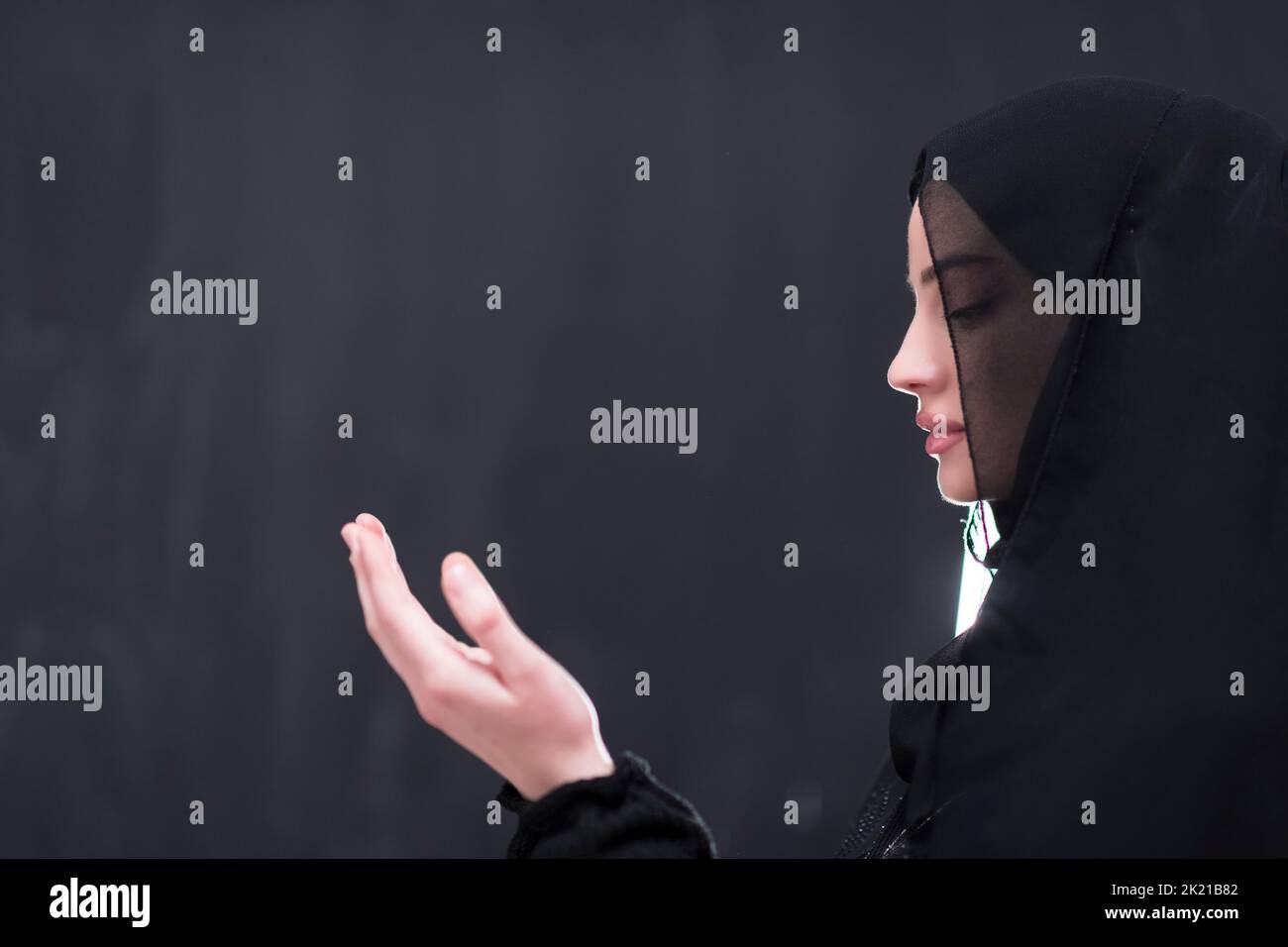 Portrait of beautiful muslim woman in fashionable dress with hijab ...