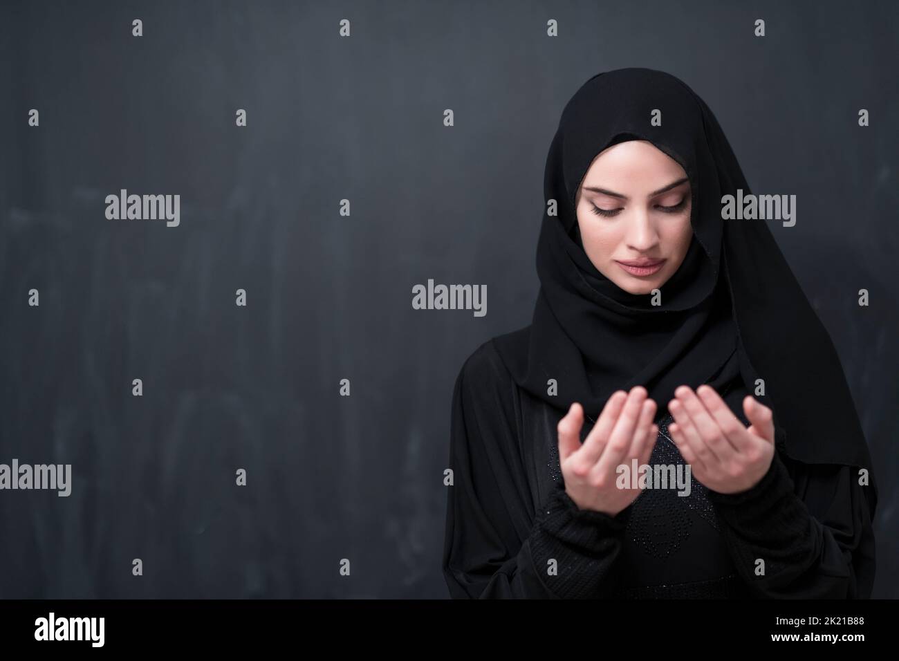 Portrait of beautiful muslim woman in fashionable dress with hijab ...