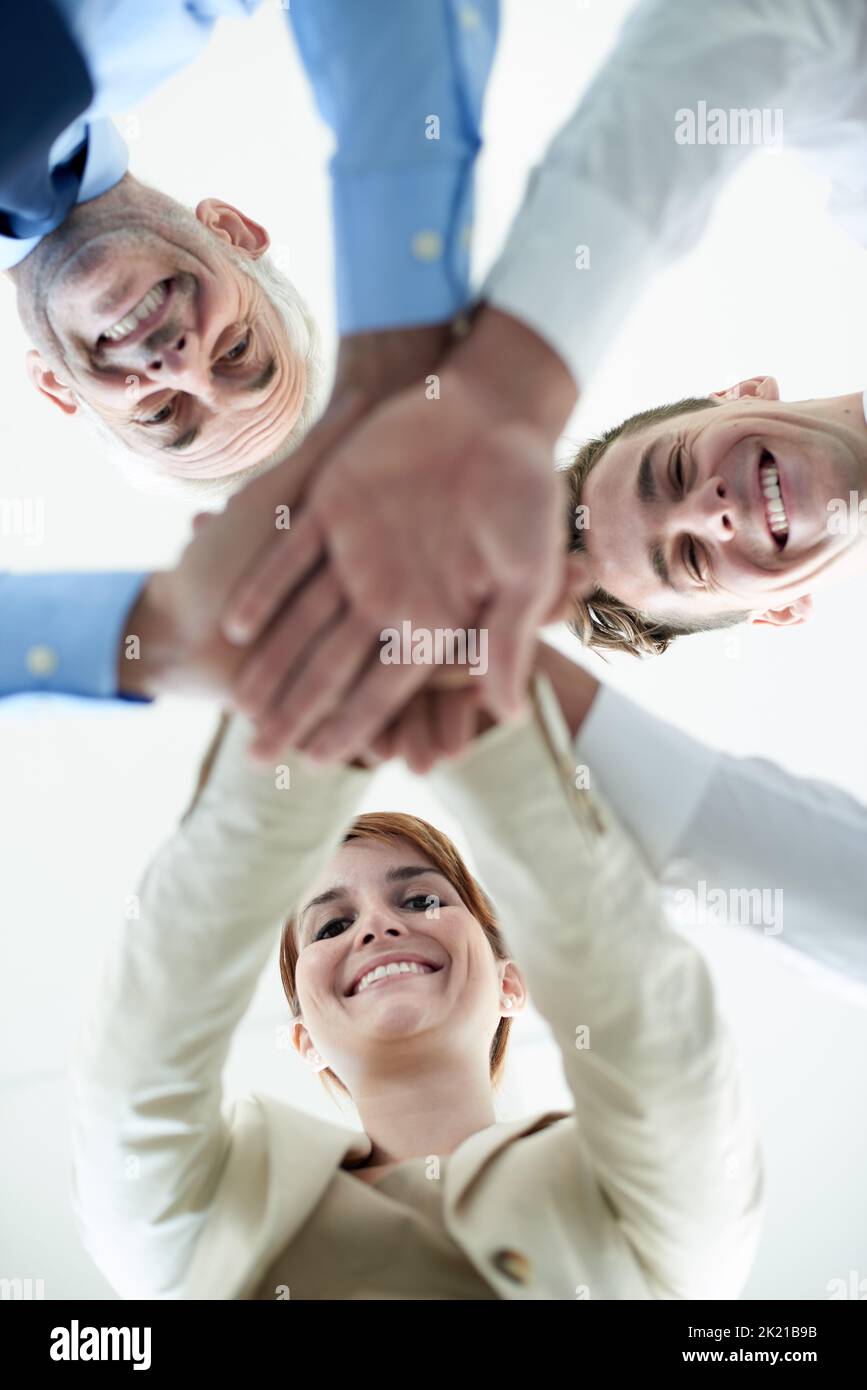Group business people standing huddle hi-res stock photography and ...