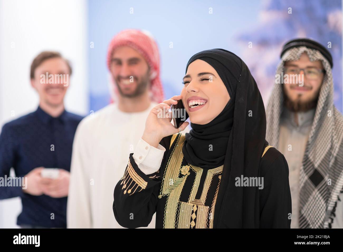 Group portrait of young Muslim people women in fashionable hijab dress ...