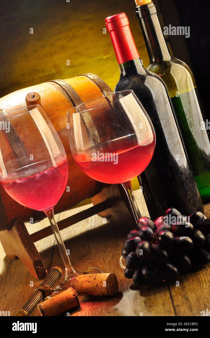 Glass and bottle of wine on the table Stock Photo - Alamy