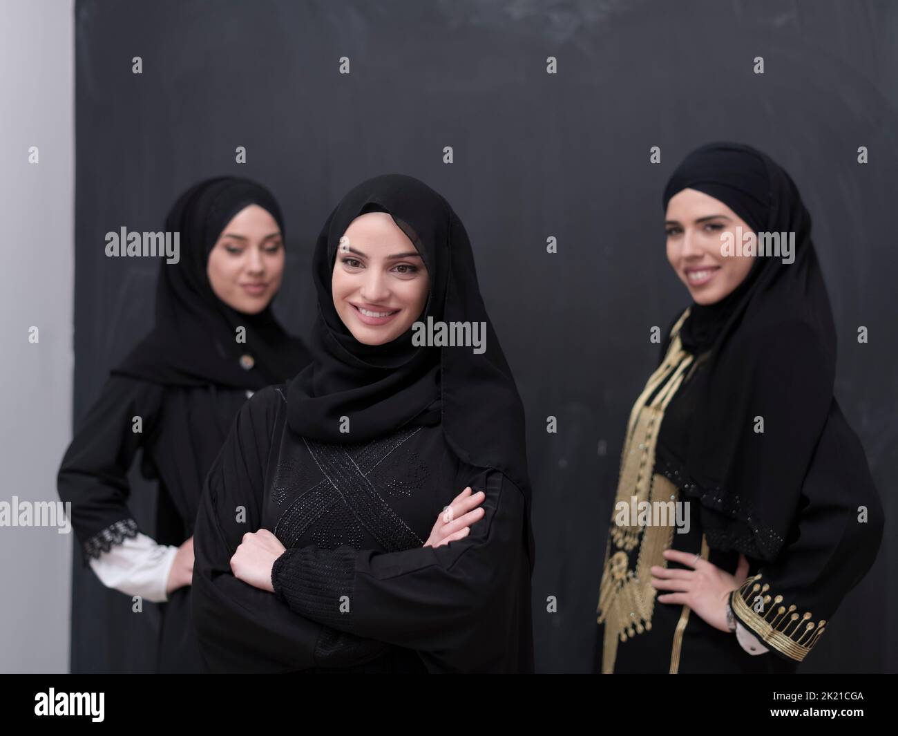 Group portrait of beautiful Muslim women in a fashionable dress with ...