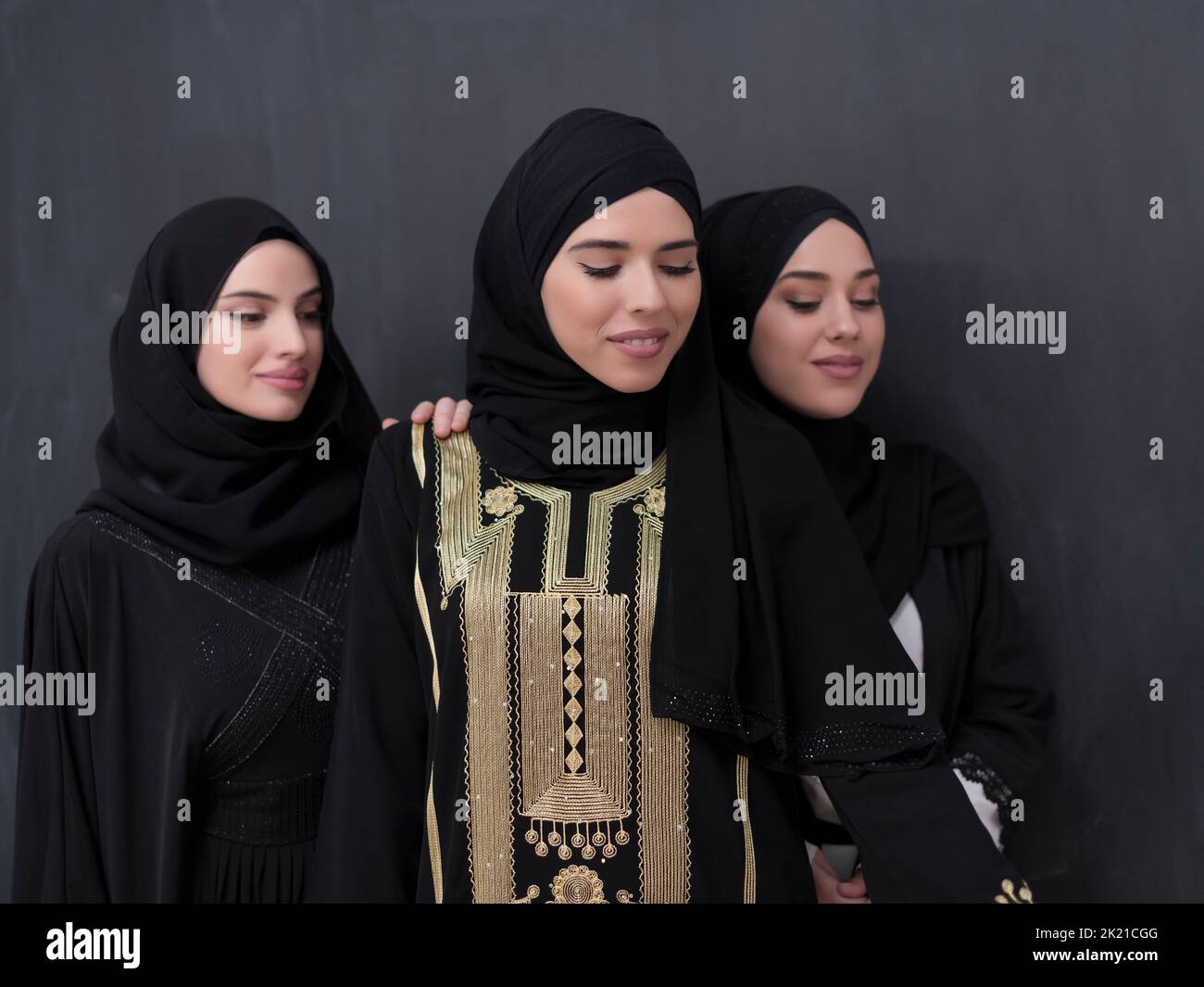 Group portrait of beautiful Muslim women in a fashionable dress with ...