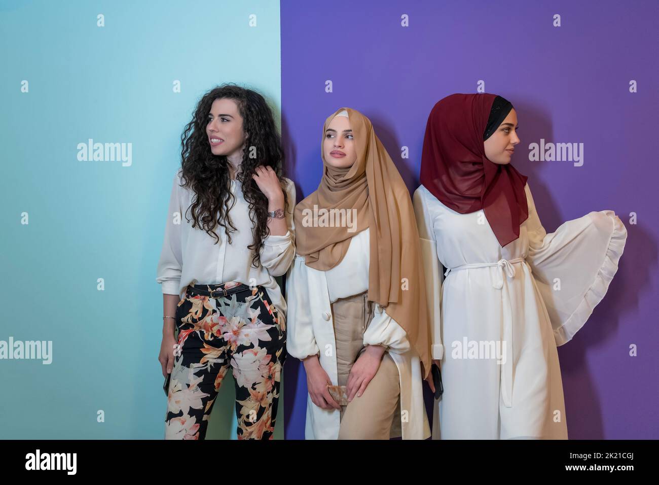 Group portrait of beautiful Muslim women two of them in a fashionable ...