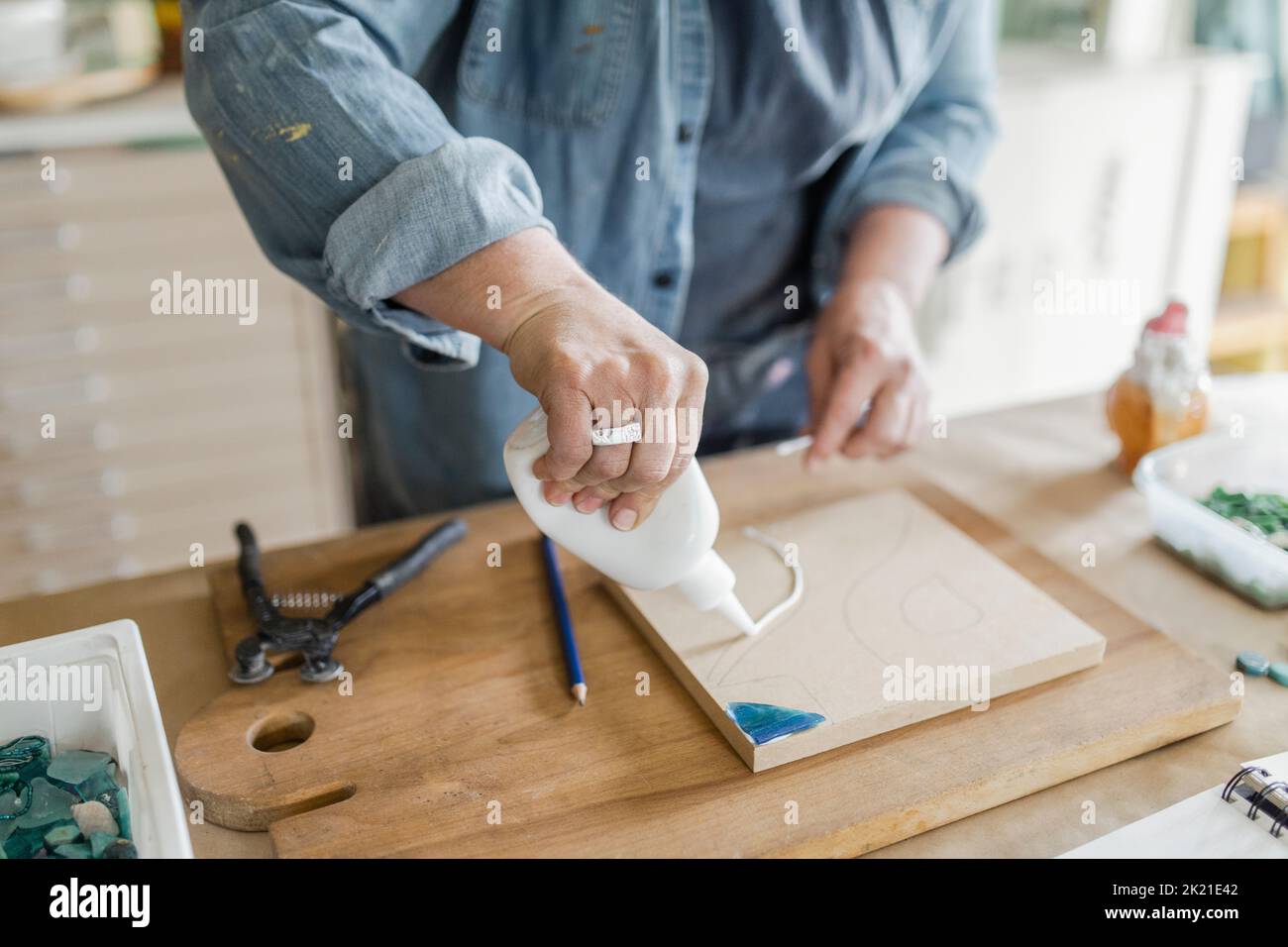 Applying glue hi-res stock photography and images - Alamy