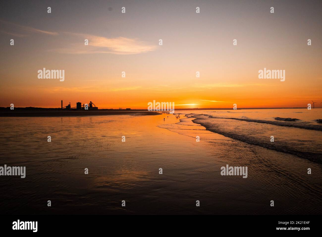 A beautiful scenery of sunset over the sea Stock Photo - Alamy