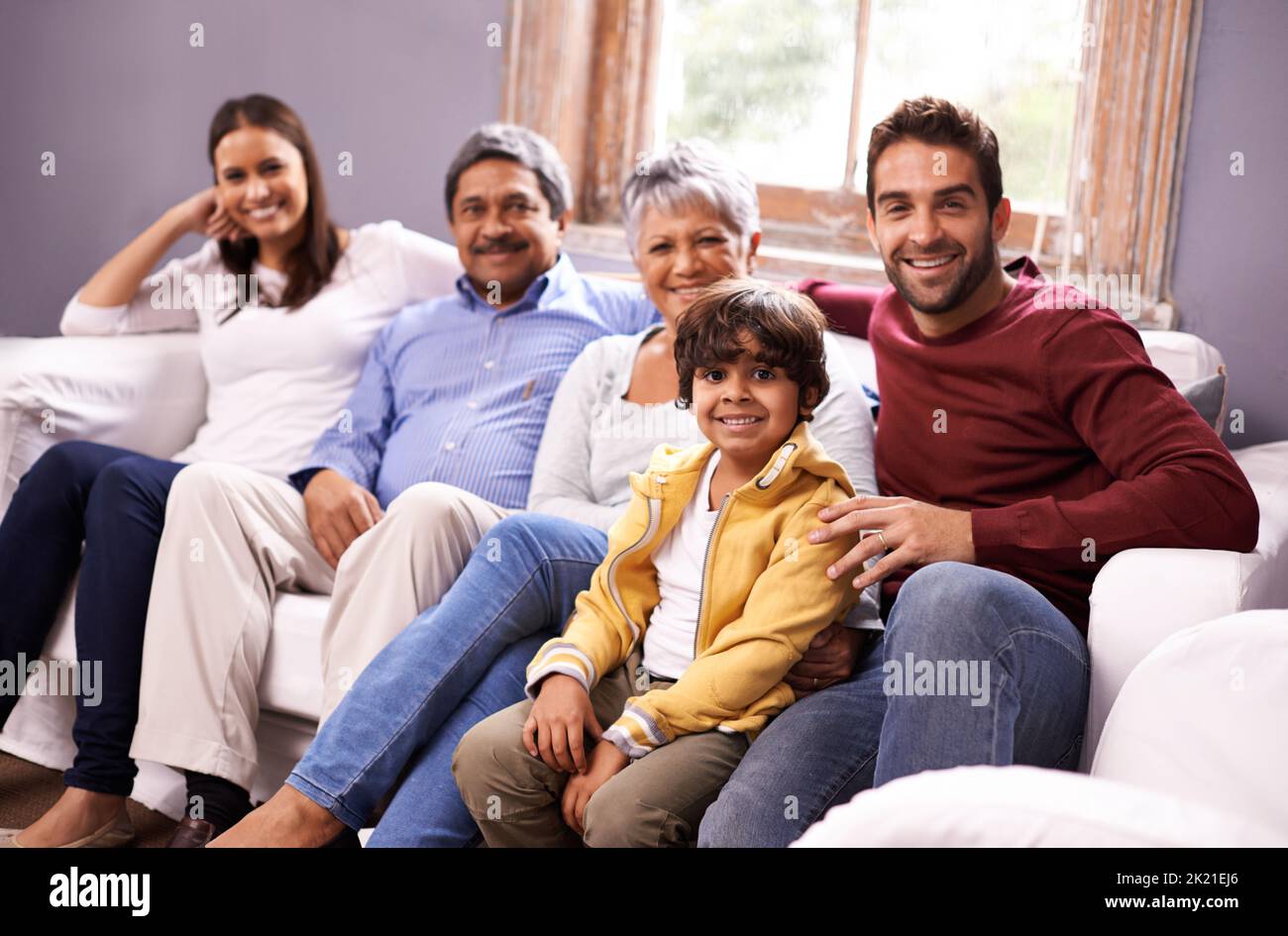 Family over everything. Portrait of a family bonding together in the ...