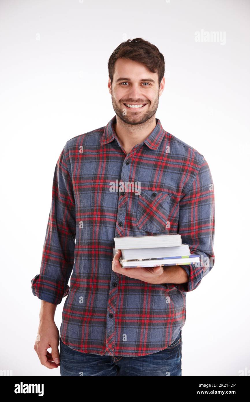 Feeling positive about my education. Studio portrait of a smiling young ...