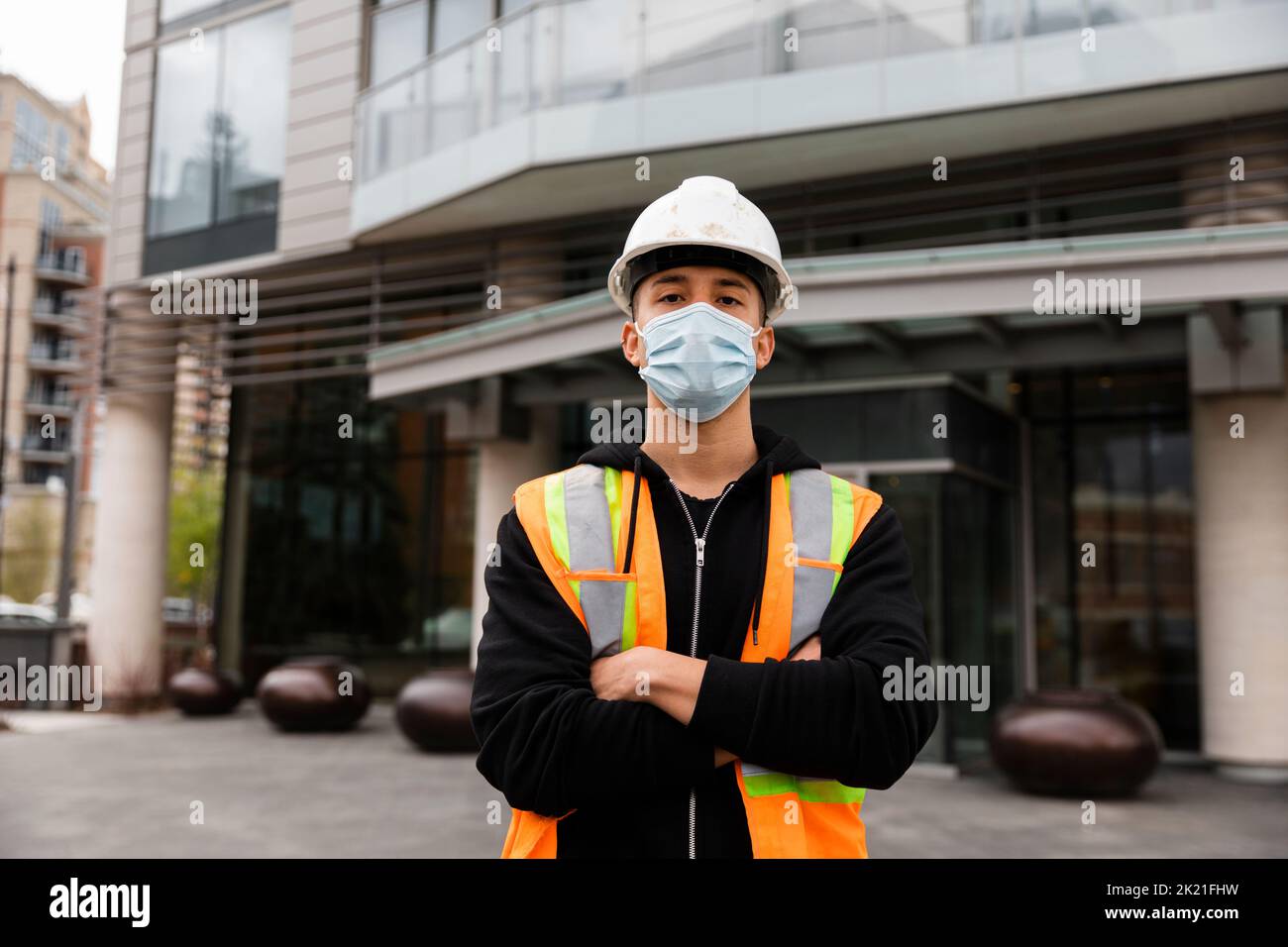 Safety hard hat and covid mask hi-res stock photography and images - Alamy