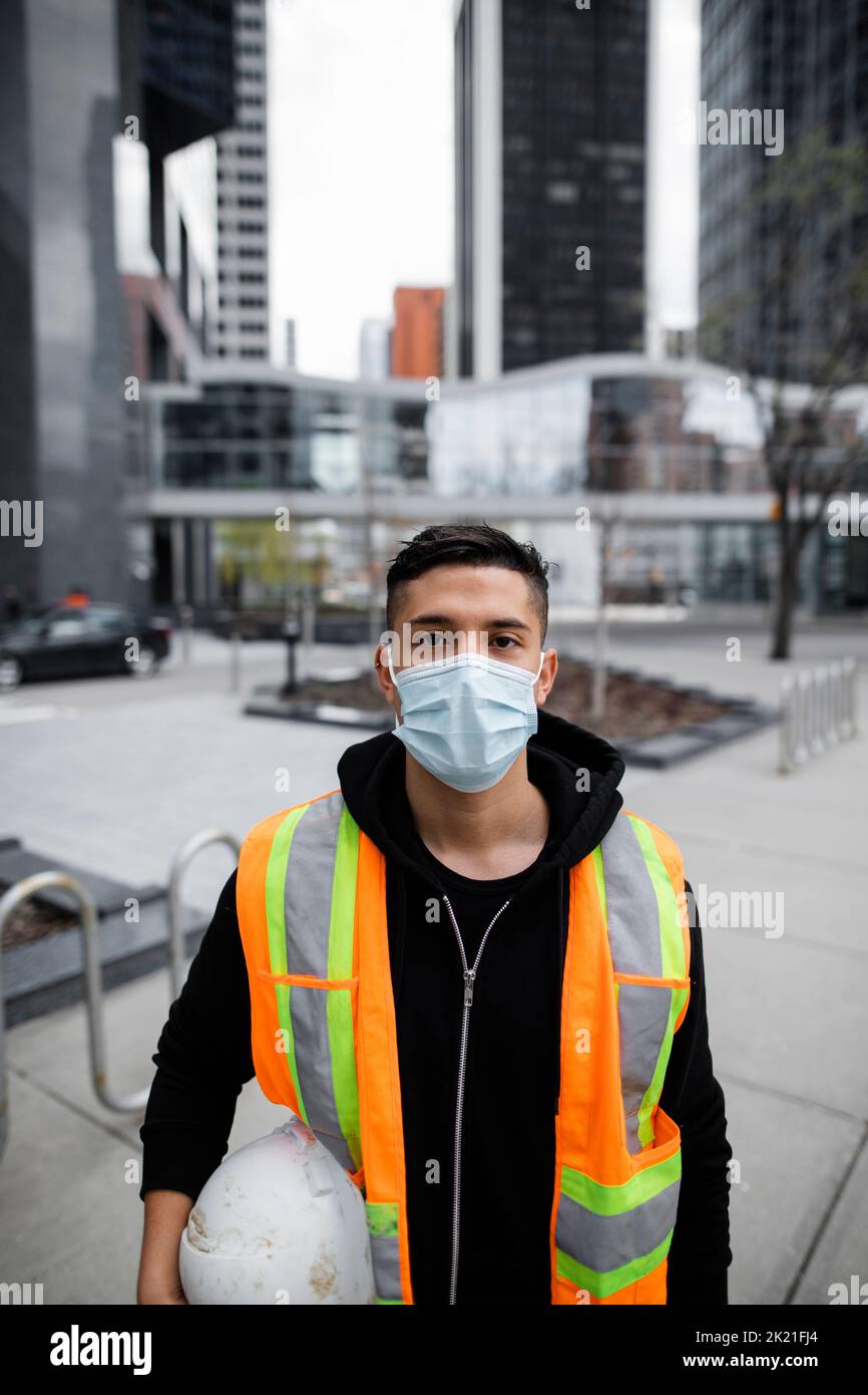 Black construction worker and mask hi-res stock photography and images ...