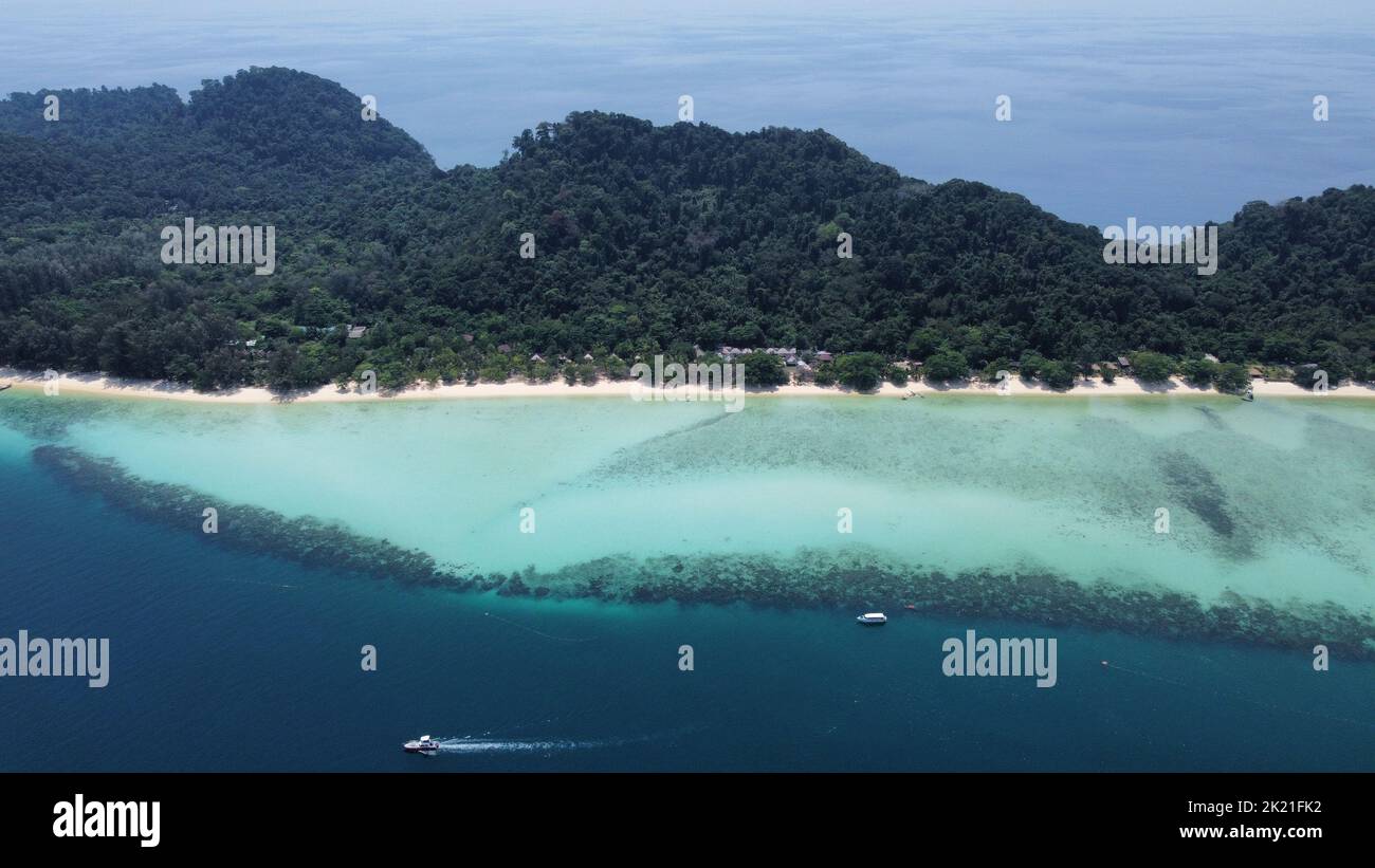 An aerial shot of Ko Kradan island in Thailand with forests and ...