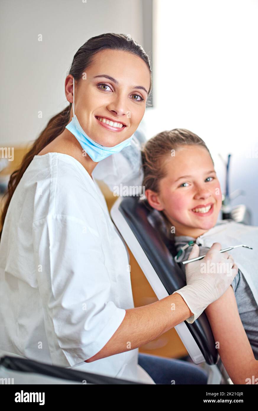 Time for a routine check-up. Portrait of an attractive female dentist ...