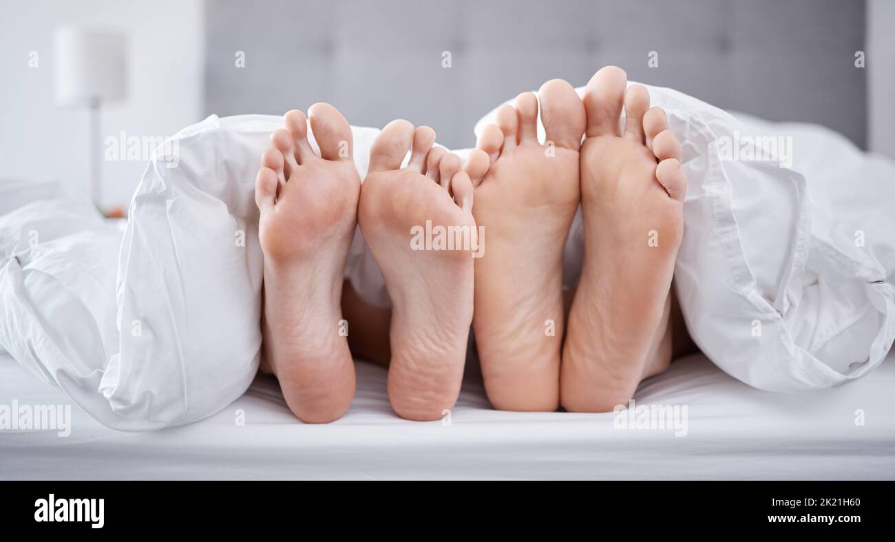 Relax Couple Feet And Bedroom Blanket For Comfort While Resting With Partner In House Love