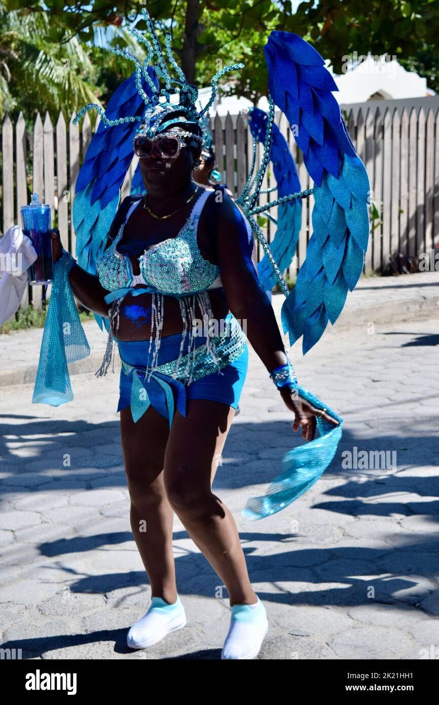 A lone female dancer in the San Pedro, Belize, Carnival 2022 parade ...
