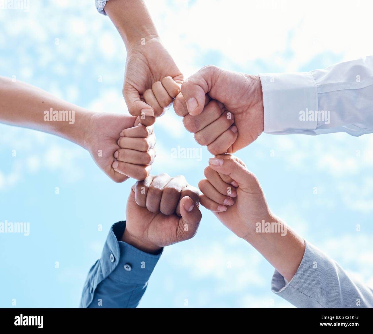 Teamwork collaboration, diversity fist bump and mission success of business. Partnership support ...