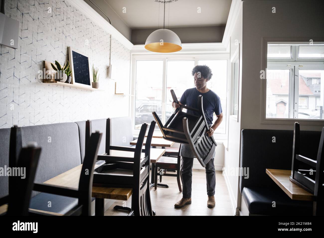 Preparing to open restaurant hi-res stock photography and images - Alamy