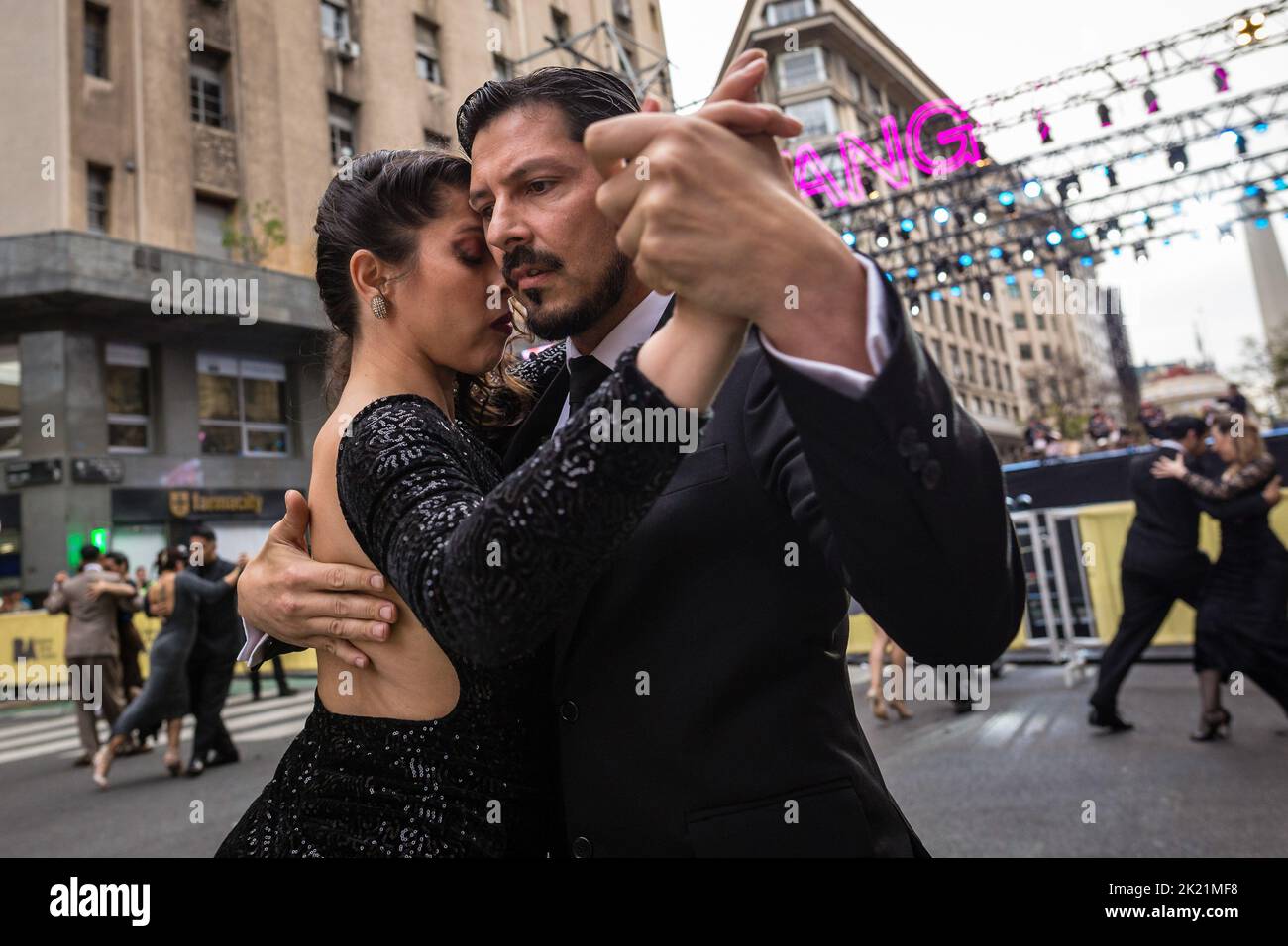 A group of couples dances the tango in front of thousands of people ...