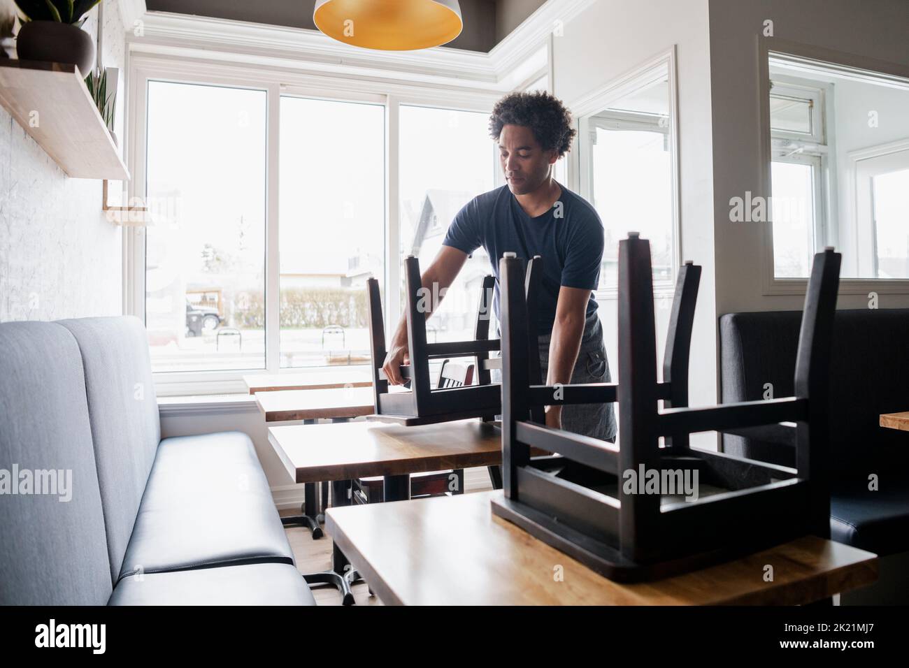 Preparing to open restaurant hi-res stock photography and images - Alamy