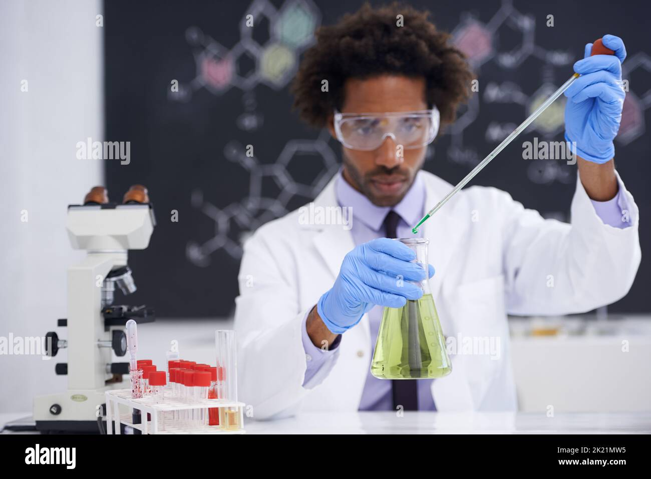 Scientist conducting an experiment hi-res stock photography and images ...