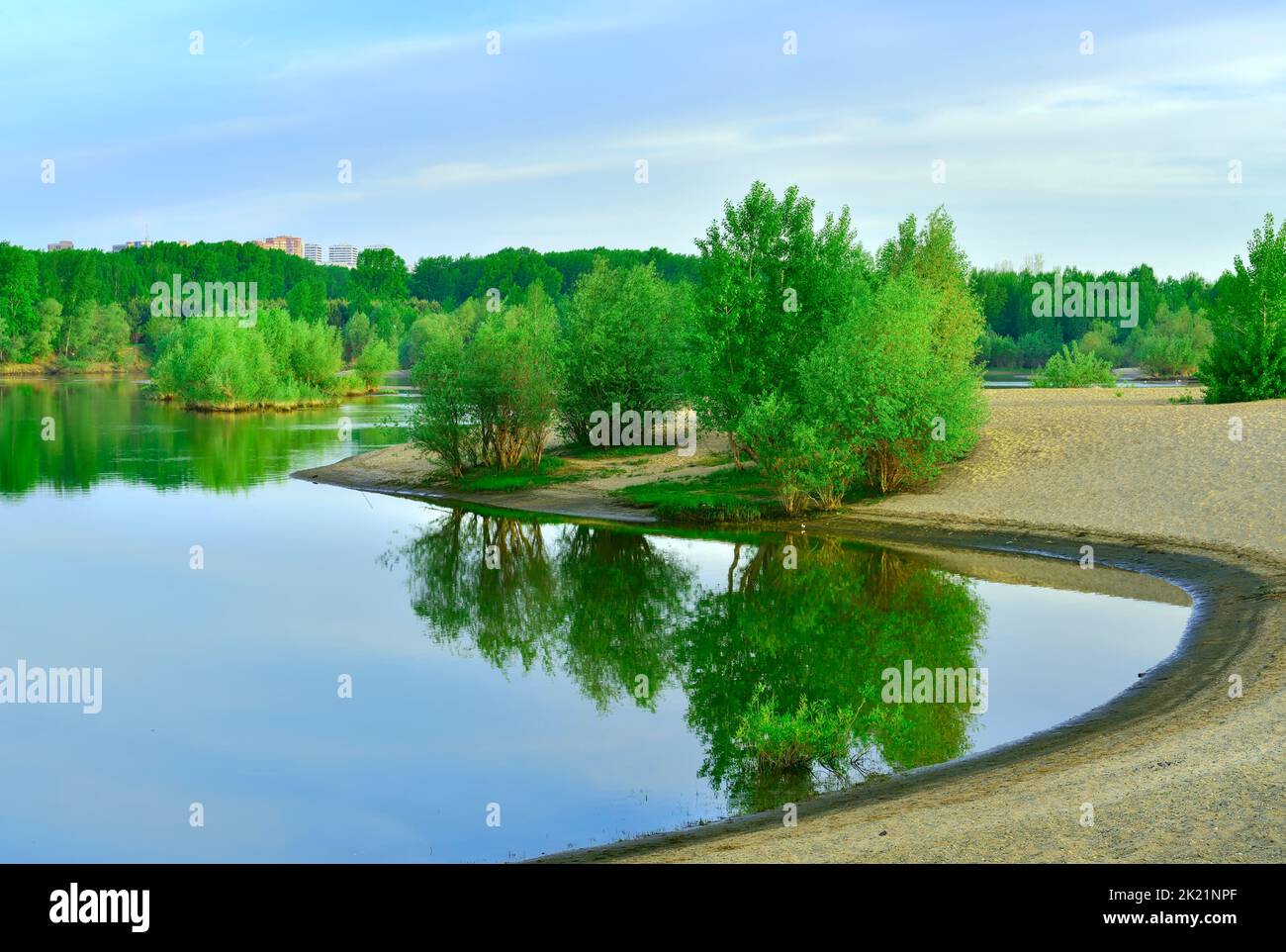 Sand spit on the Ob river. A deserted beach in the morning on the ...