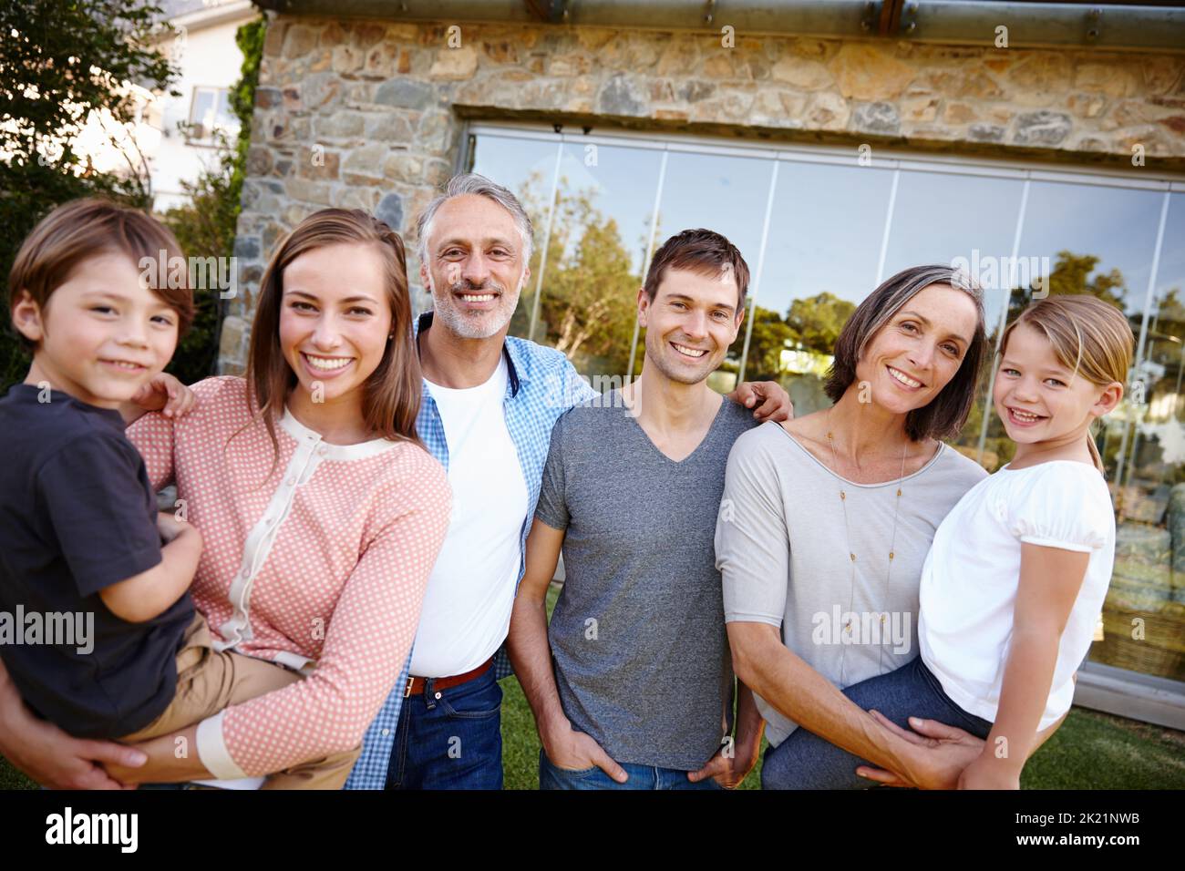 Welcomed by happy faces. A cropped portrait of a happy multi ...