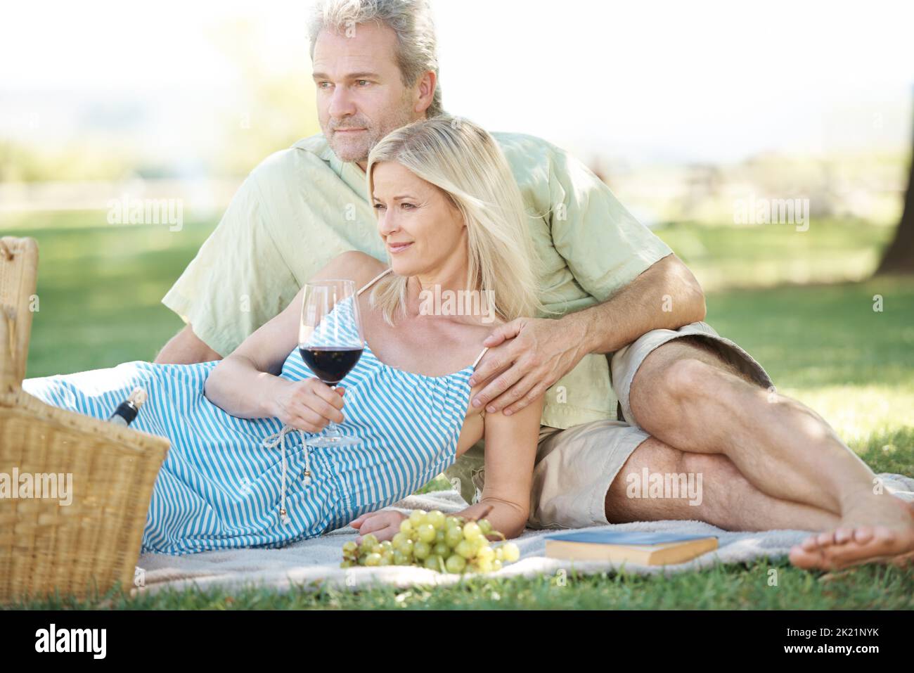 Getting away from it all. A smiling husband and wife enjoying a ...