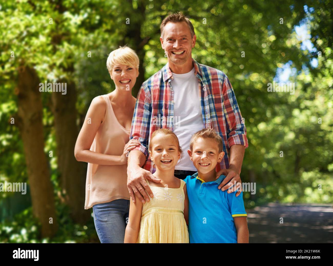 Family is a little world created by love. A cropped portrait of a happy ...