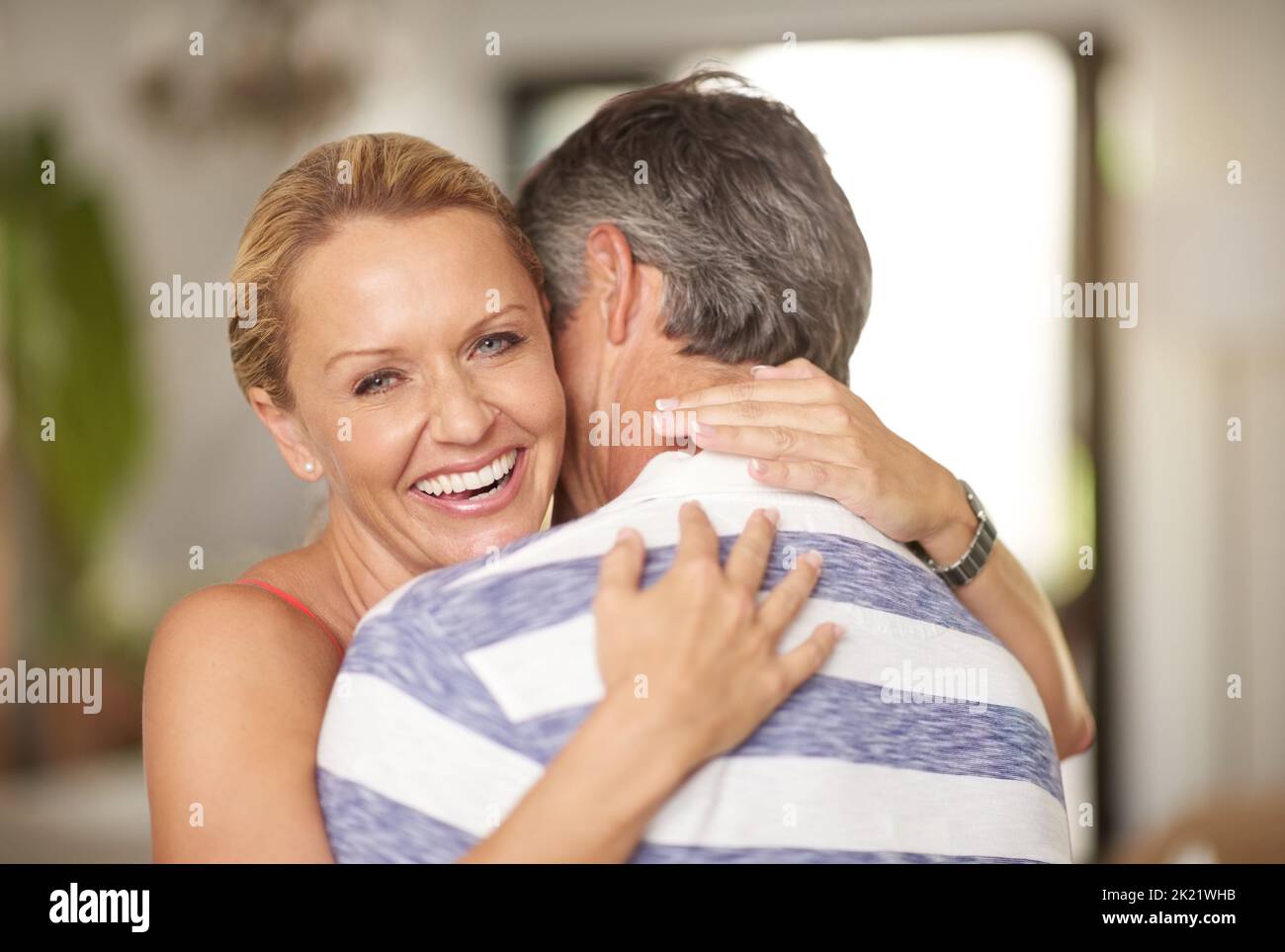 Proud wife of an amazing husband. Portrait of a beautiful woman ...