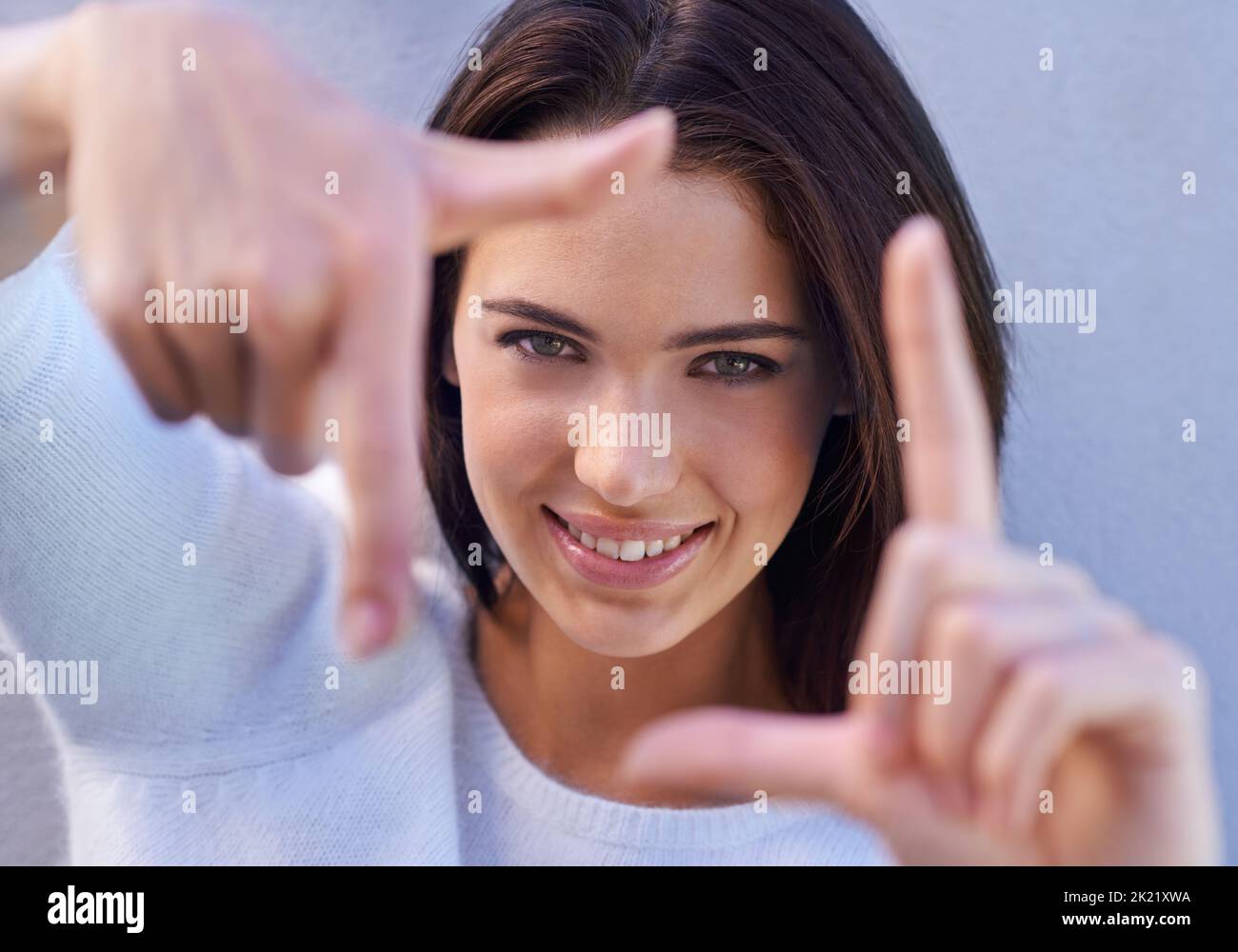 Looking at life from a different angle. Portrait of an attractive young ...