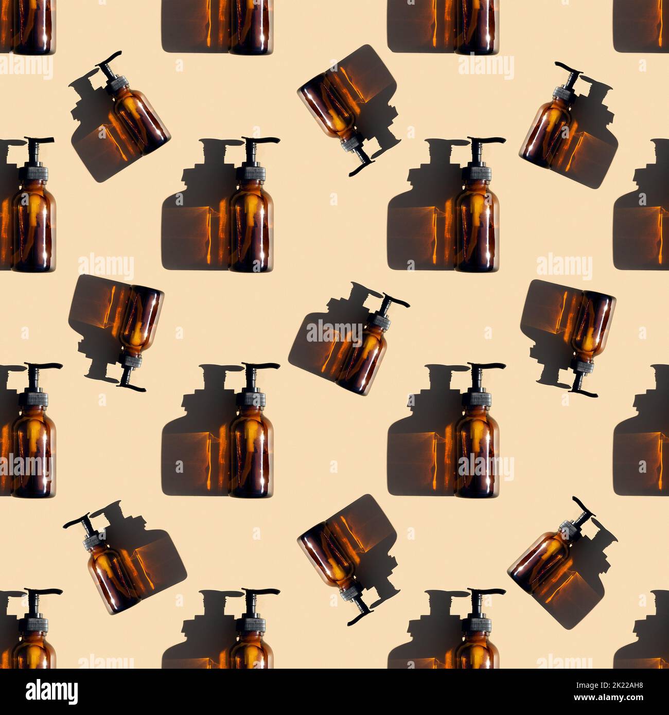 Seamless pattern made with brown glass bottle with pump of cosmetic ...