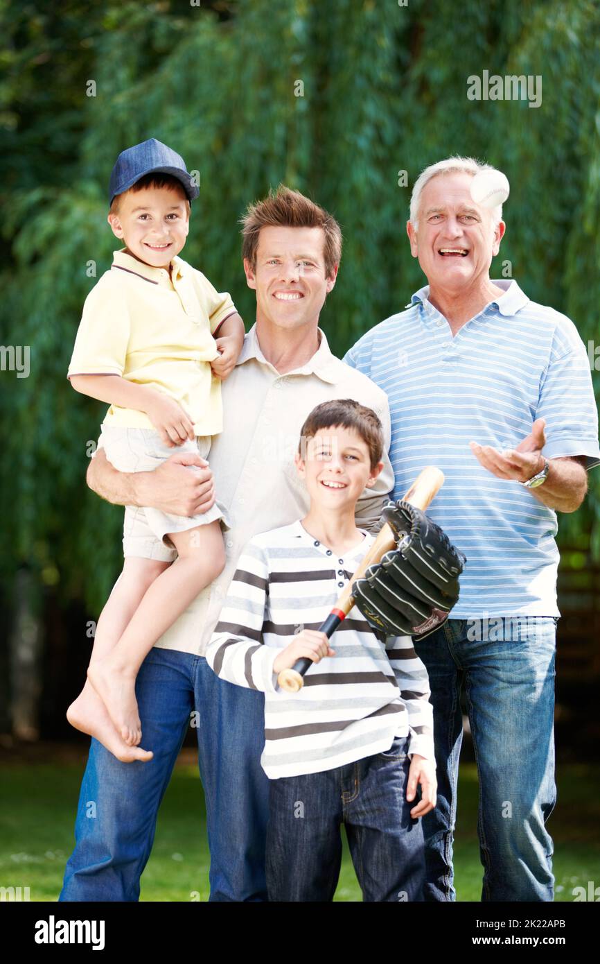 Theres baseball in their blood. Portrait of a proud father and ...