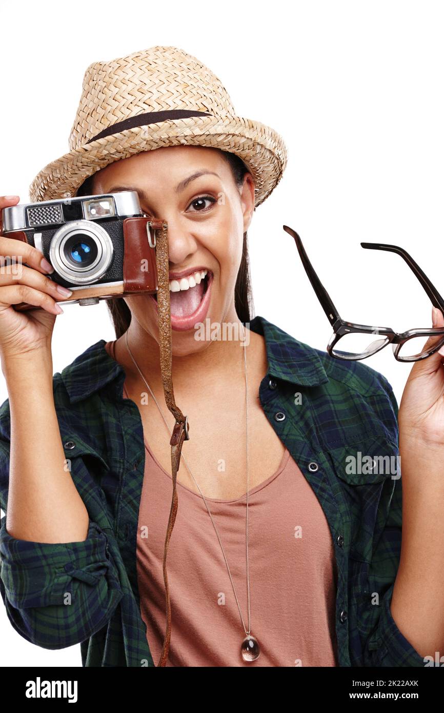 Time for happy snaps. Portrait of an attractive young woman holding a ...