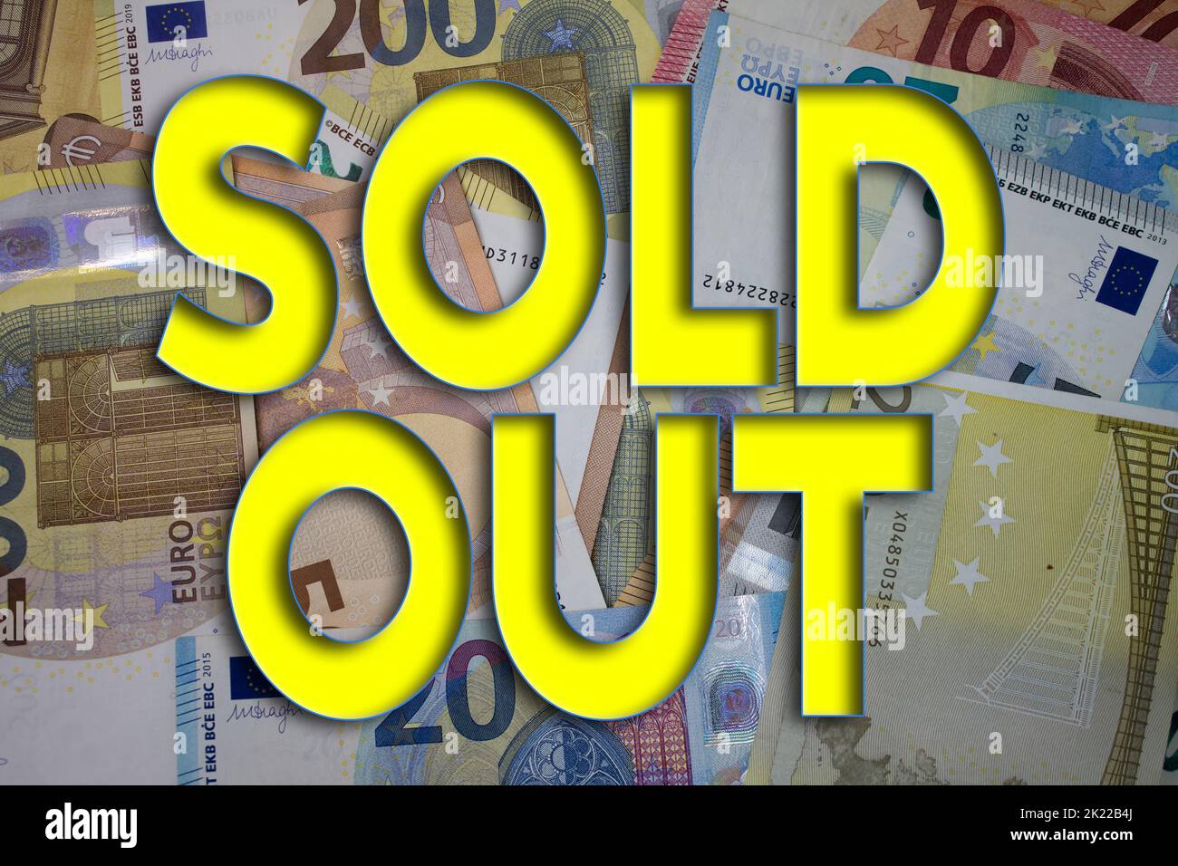 Sold Out word with money. Paper currency background with different ...