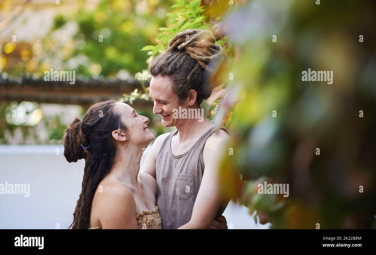 Their connection is undeniable. A cute young couple spending time ...