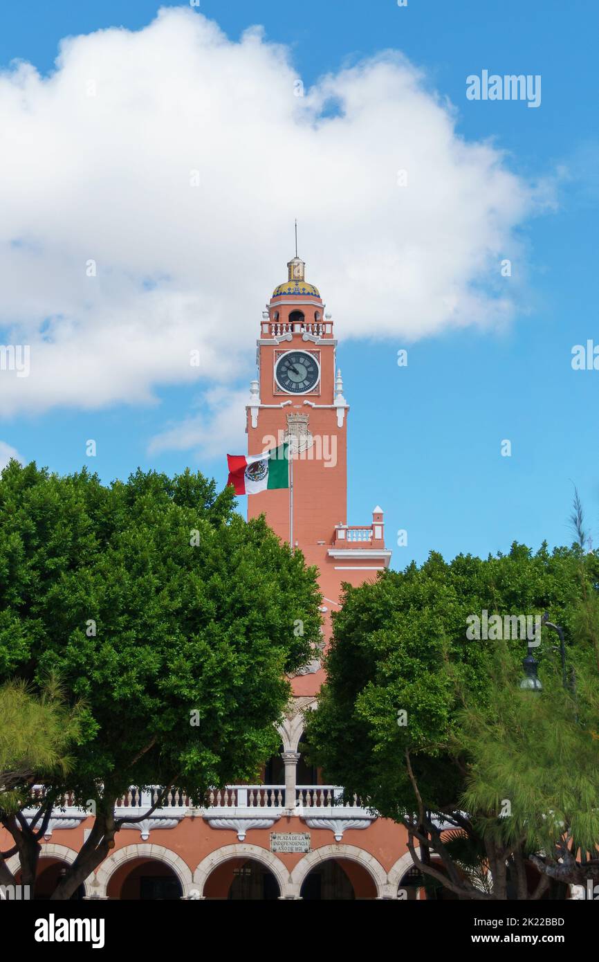 The clock tower of the Palacio Municipal de Merida on a bight day with ...