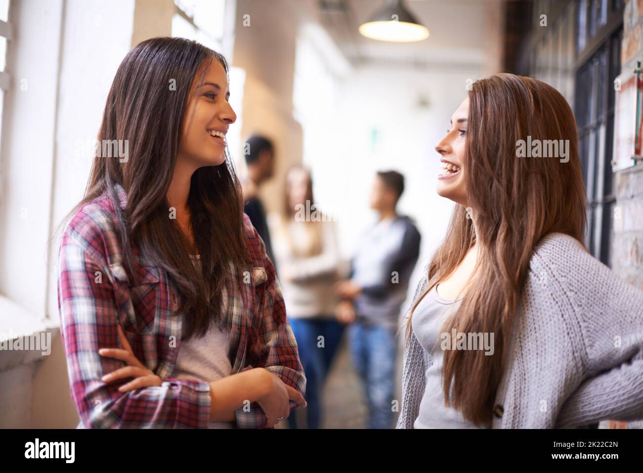 Two friends talking school hi-res stock photography and images - Alamy