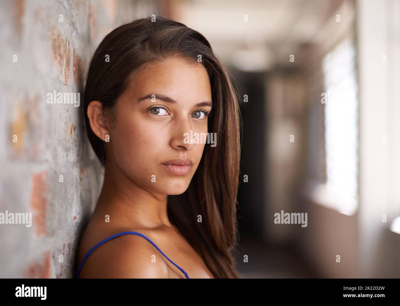 Youthful Confidence Cropped Portrait Of An Attractive Young Woman