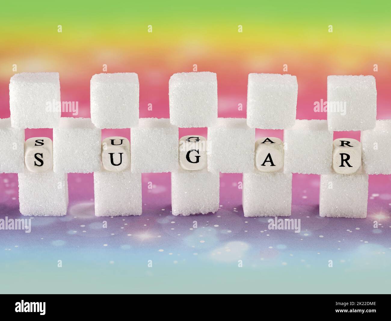 wall of sugar cubes with text on letter cubes isolated on colorful ...