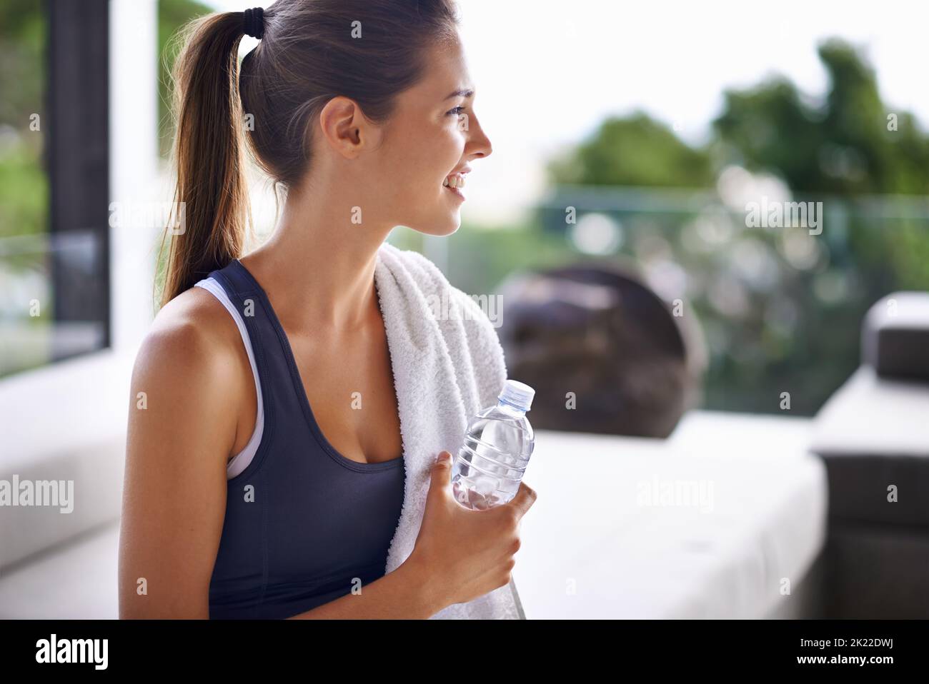 Feeling awesome after that workout. an attractive young woman relaxing ...