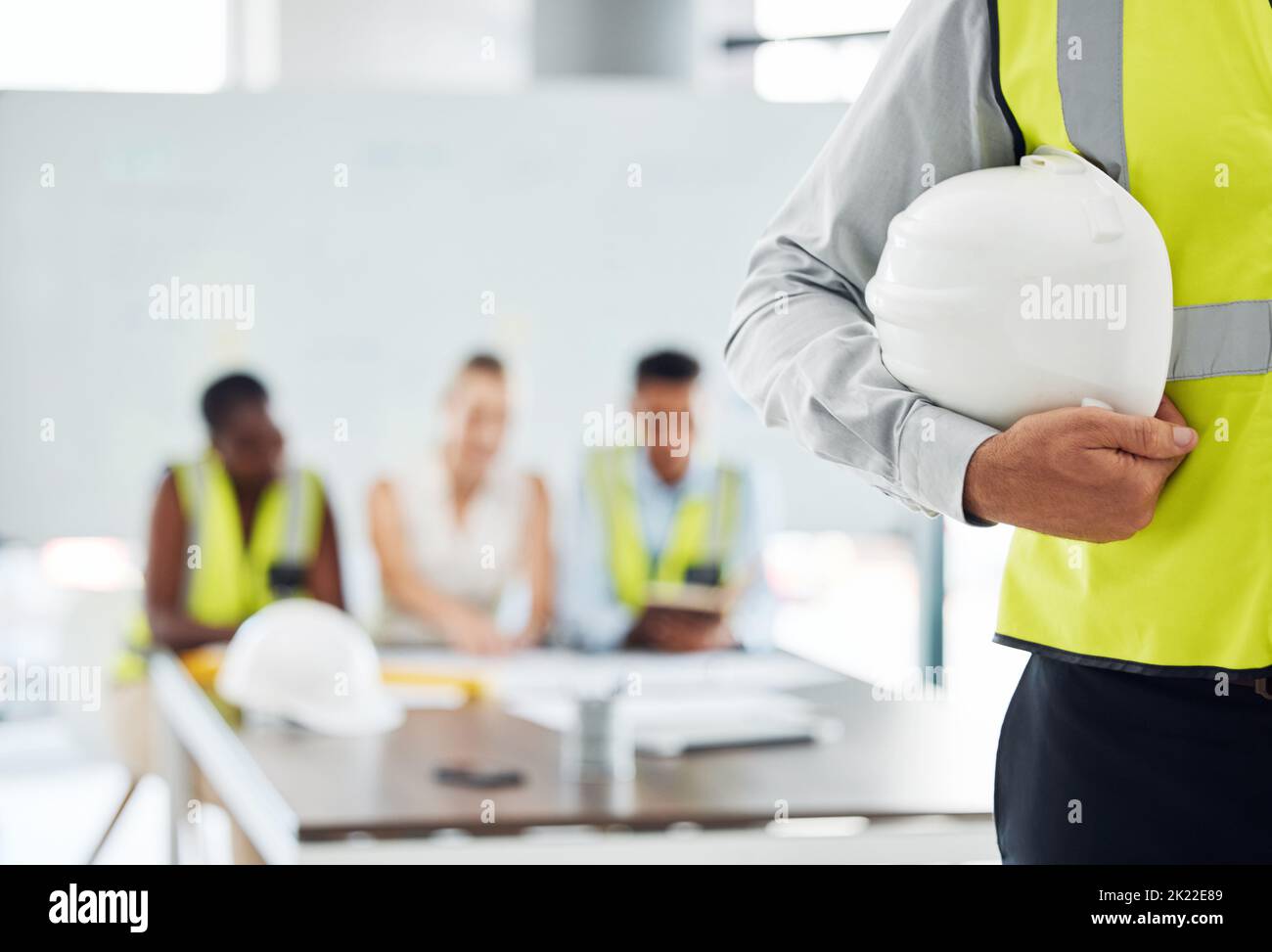 Man, building helmet and construction worker meeting with engineering ...