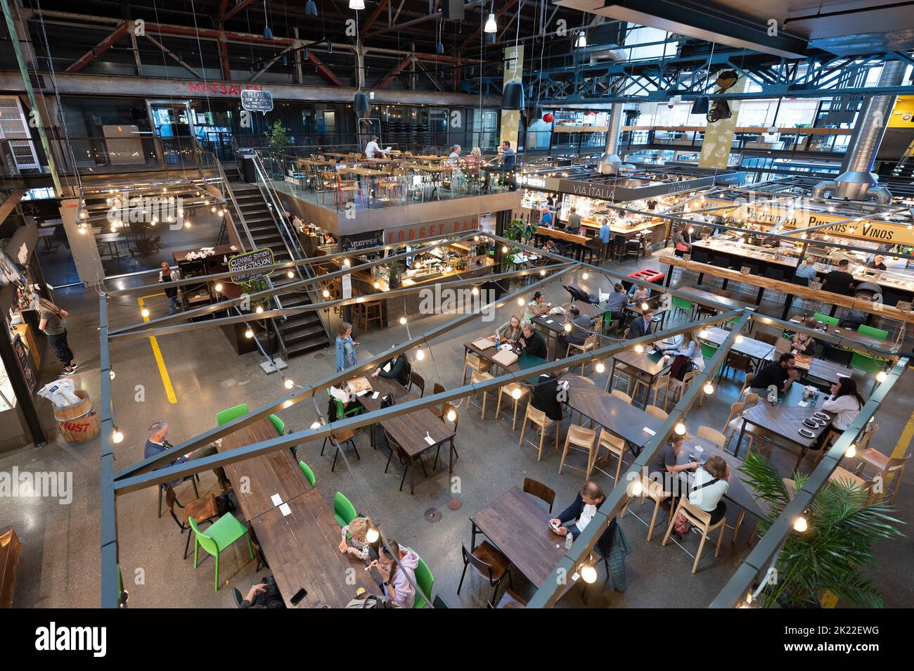 Oslo, Norway. 06th Sep, 2022. Visitors sitting in the Mathallen market hall. Credit: Sebastian ...